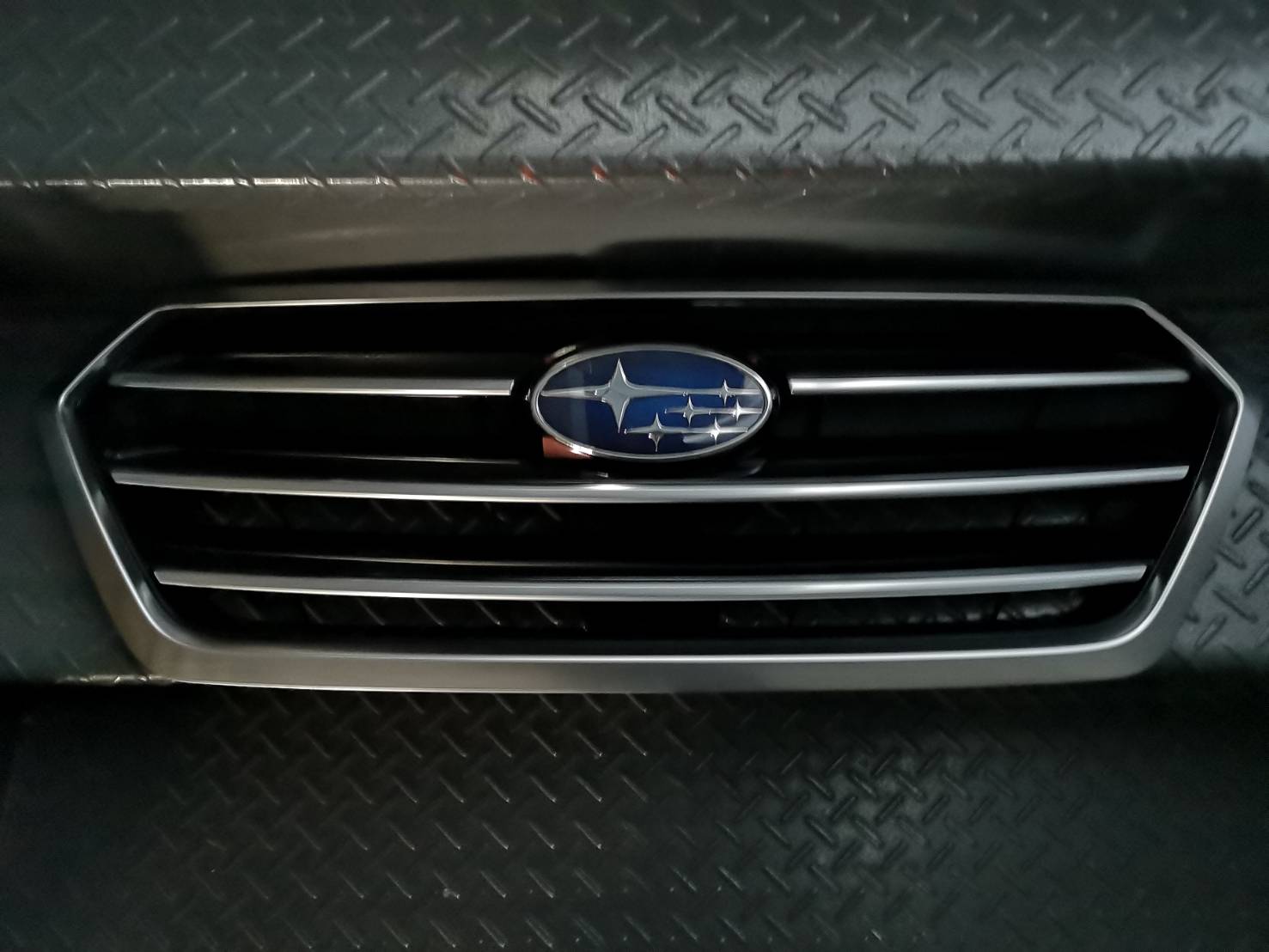 Subaru 91121 FRONT GRILLE WITH EMBLEM | JDM Japanparts.com | BN C-